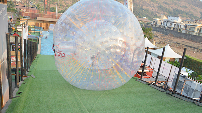 Enjoy thrilling sport Aqua Zorb at Della