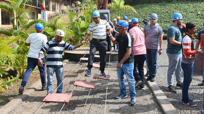 Try team building activity Low Rope Challenge Course at Della Adventure ...